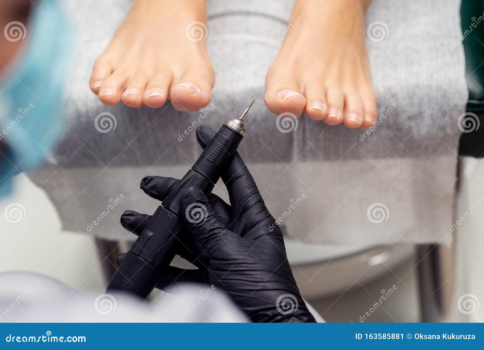 Pedicure Technician is Using Special Electric Machine for Peeling Feet ...