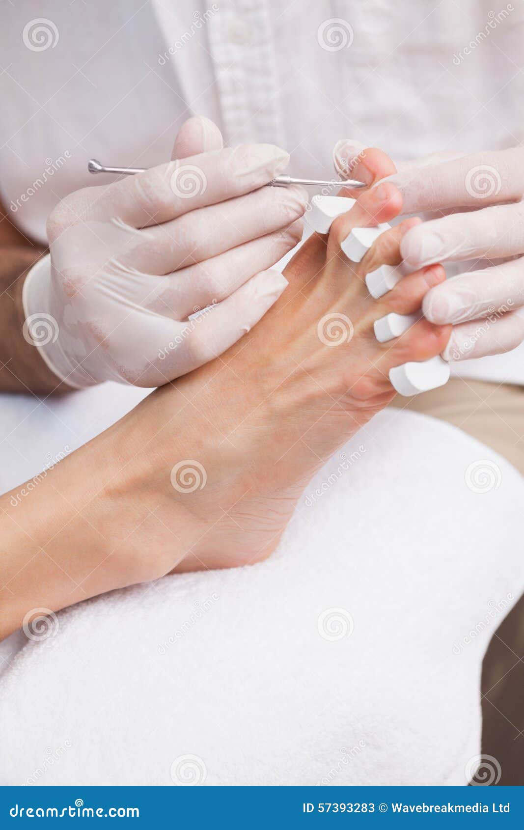 Pedicurist Cleaning a Customers Toe Nails Stock Image - Image of ...