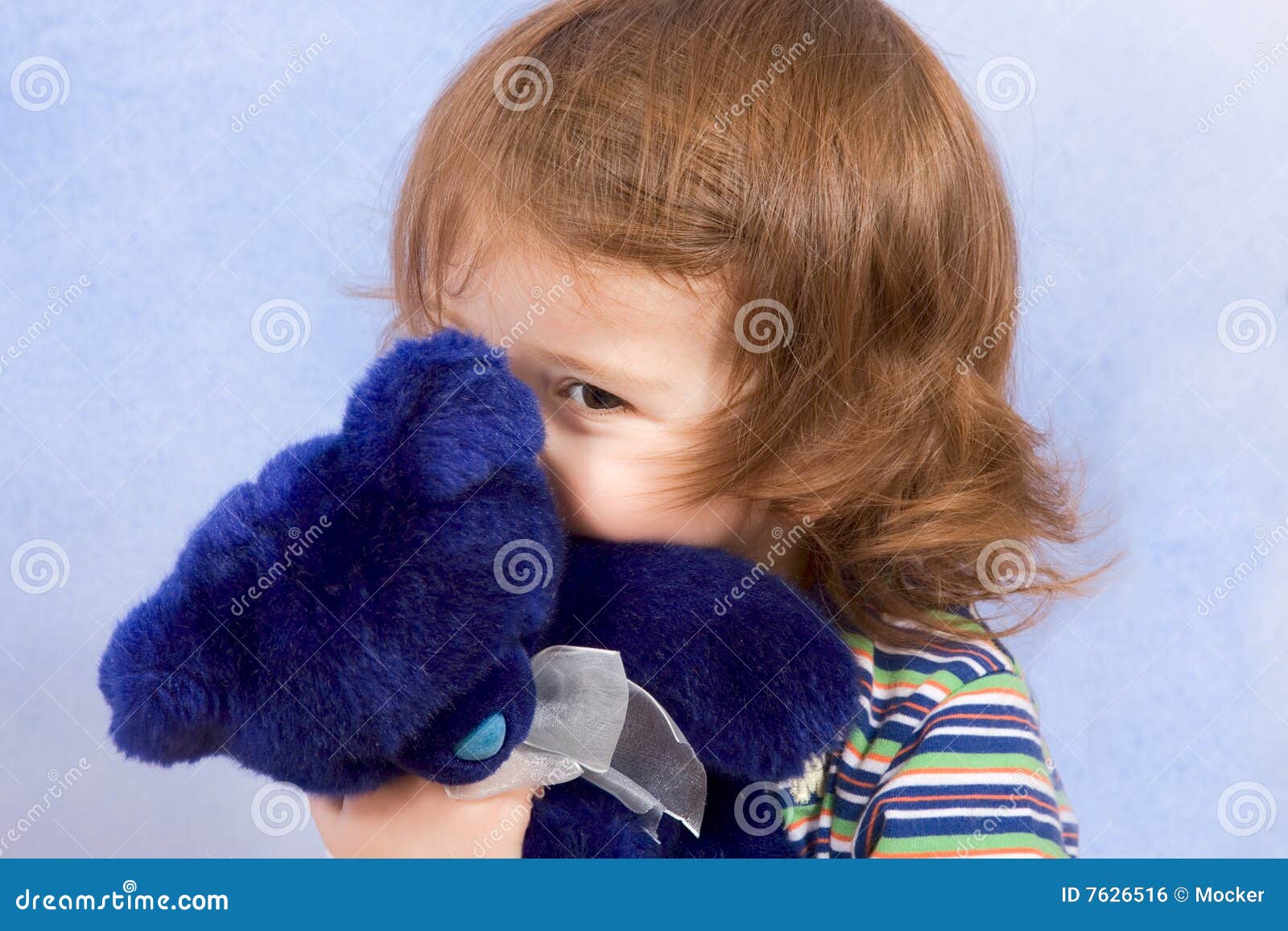 Peek-a-boo - Child Peeking From Blue Teddy Bear Stock Photo ...
