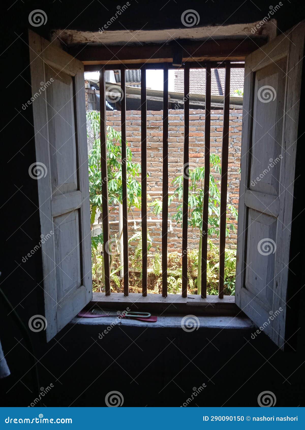 Peek Outside with Wooden Barred Windows Stock Photo - Image of ...