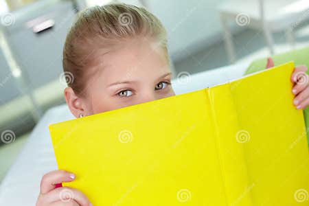 Peeking out of book stock image. Image of book, kindergarten - 27880543