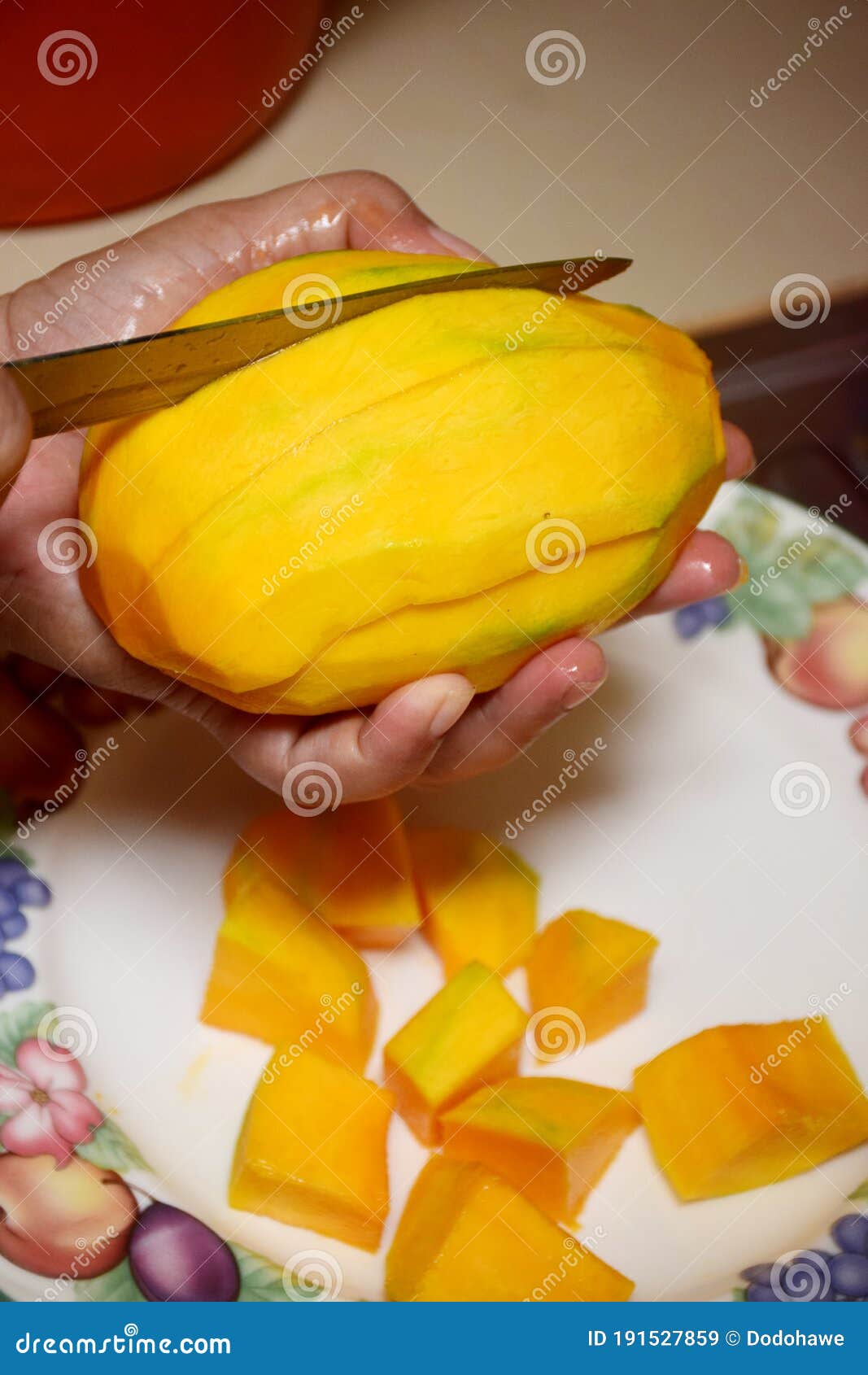 Peel the Mango on a Plate in the Kitchen Stock Image - Image of fresh ...