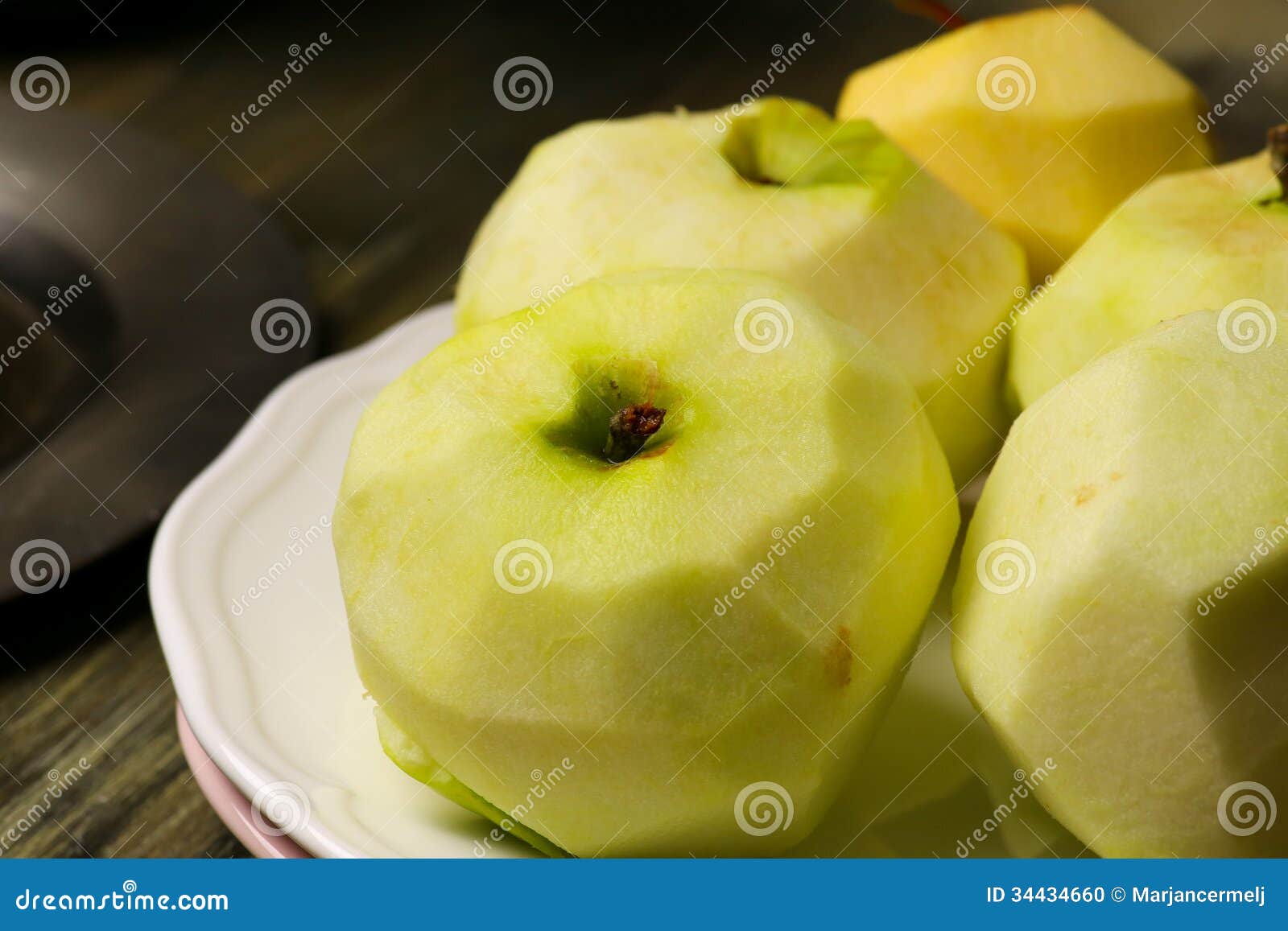 Peeled Apples on White Plate Stock Photo - Image of food, apples: 34434660