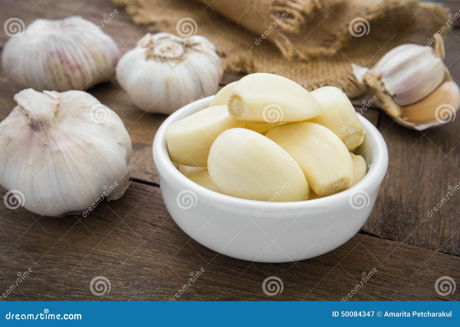 Peeled garlic in bowl stock image. Image of bowl, life - 50084347