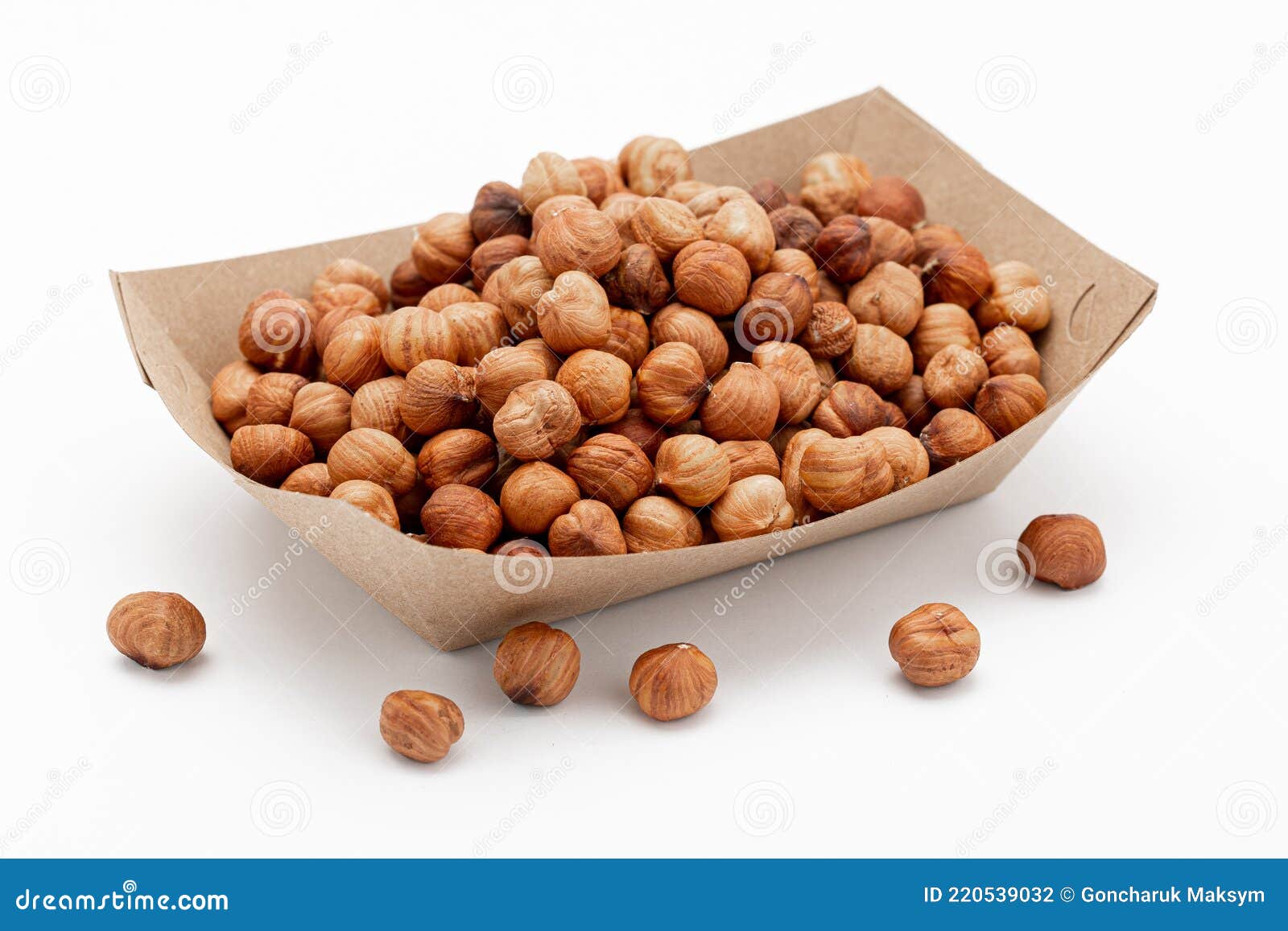 Peeled Hazelnuts in a Craft Box and a Few Nuts Scattered Around on a ...