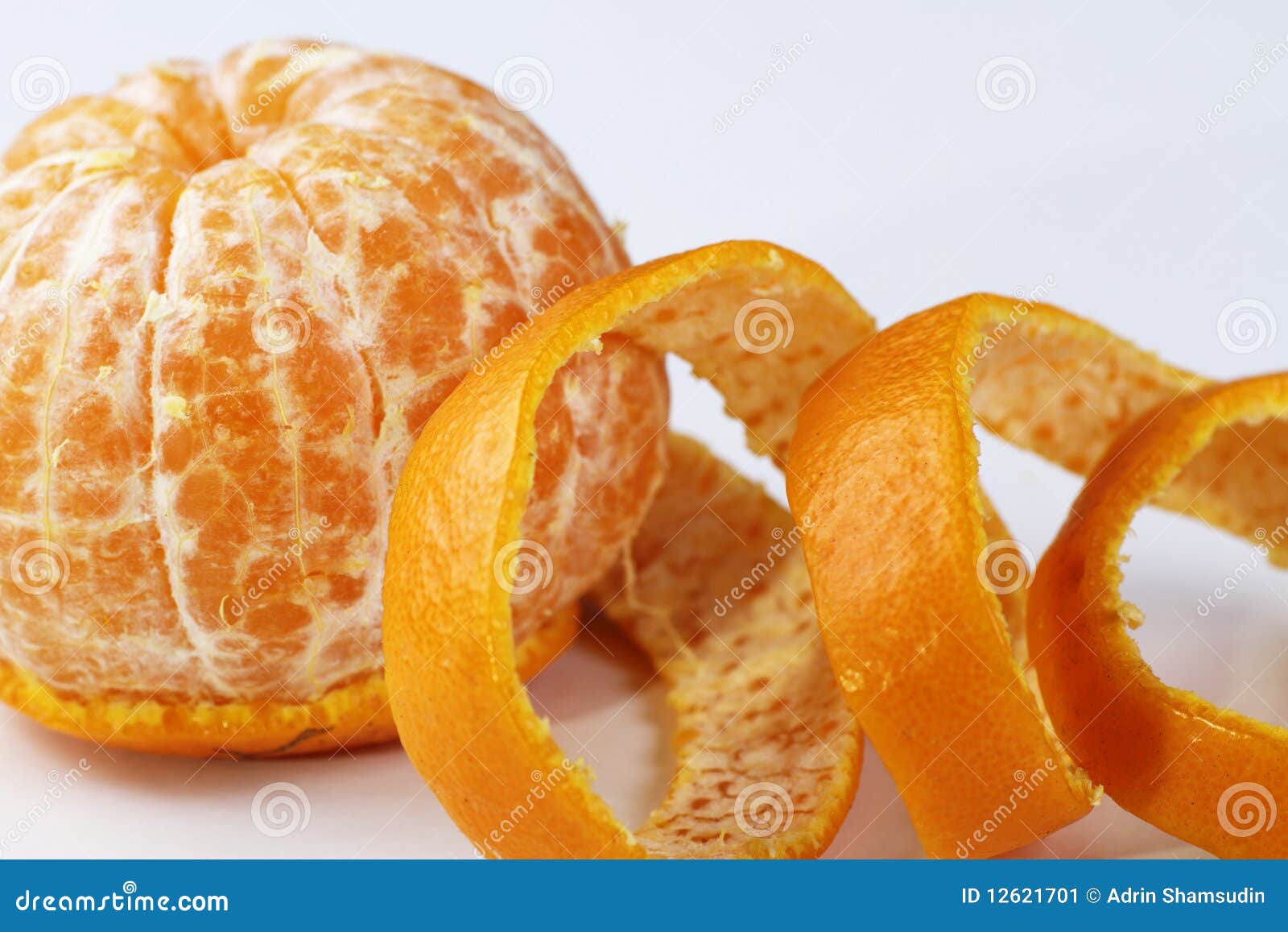 Peeled orange stock image. Image of dessert, spiral, white - 12621701