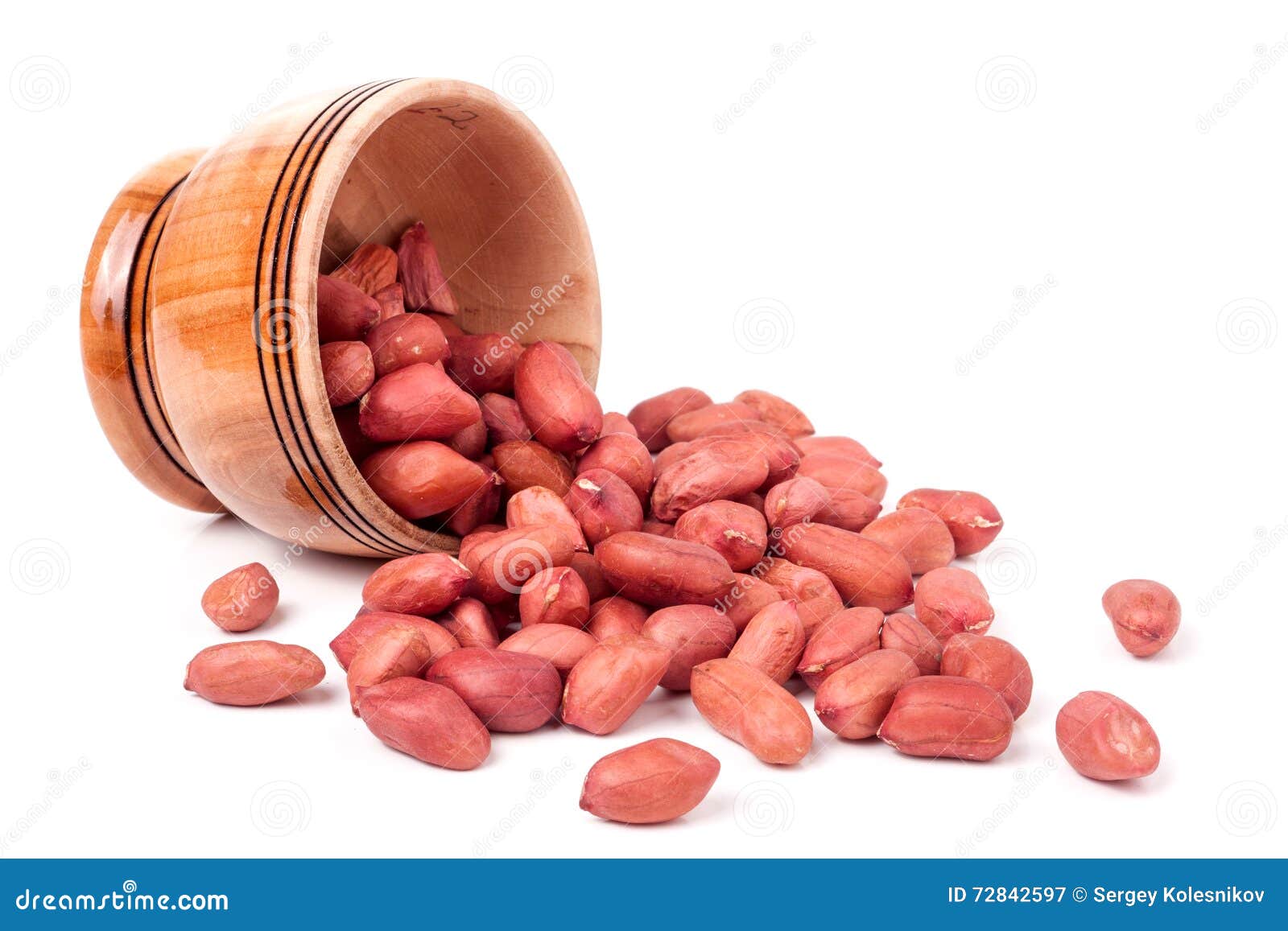 Peeled Peanuts Scattered from a Wooden Bowl on White Background Stock ...