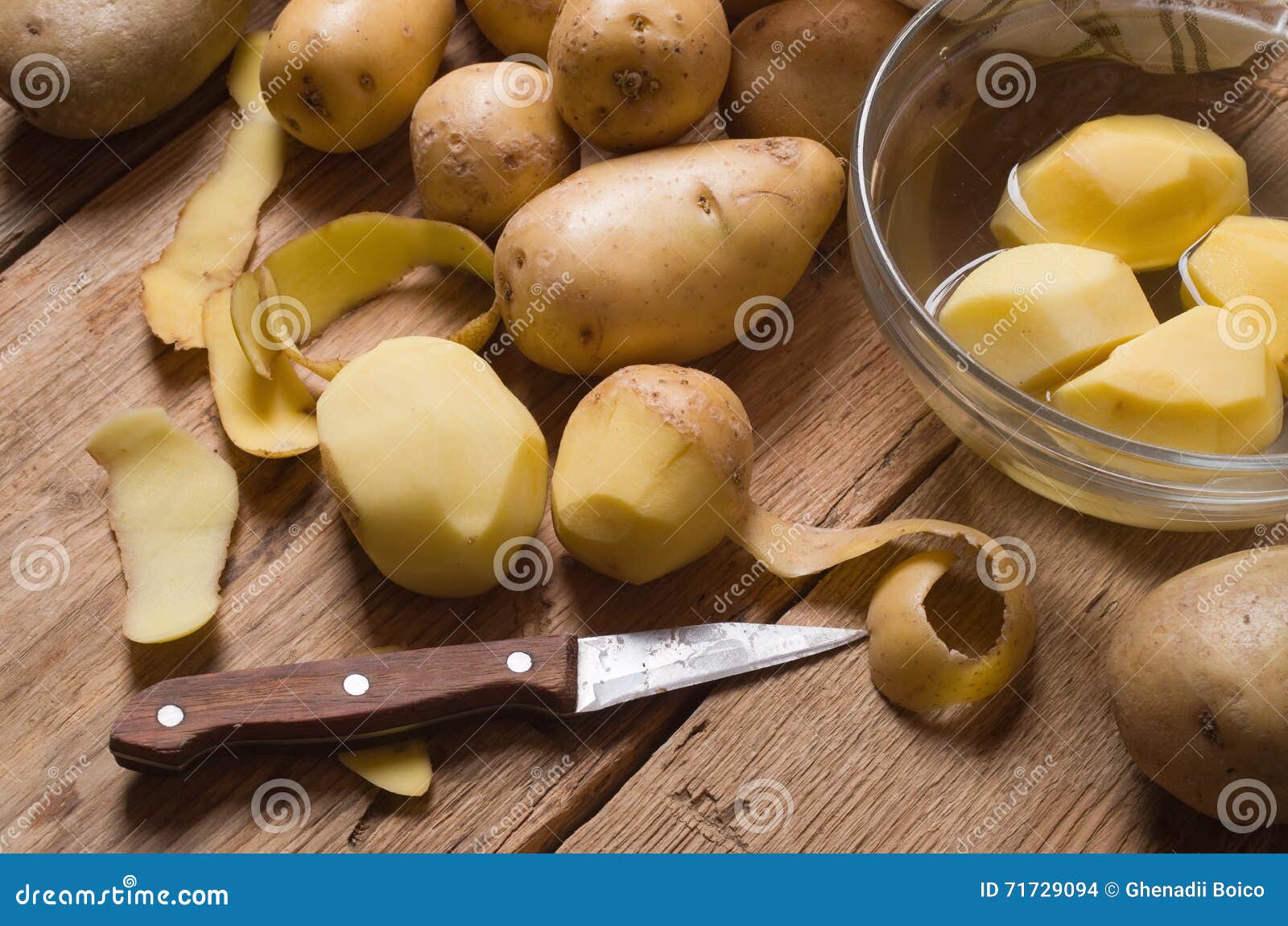 Peeled potatoes stock photo. Image of wood, agriculture - 71729094