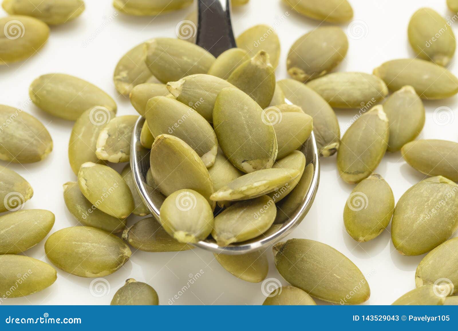 Peeled Pumpkin Seeds on a Dessert Spoon Stock Image - Image of healthy ...