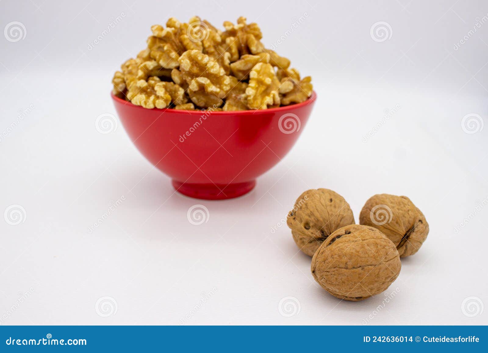 Peeled Walnuts in Red Plate Stock Photo - Image of freshness, nutrition ...
