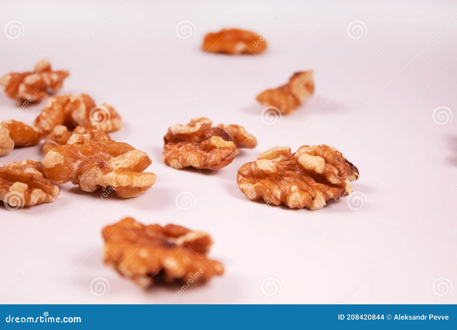 Peeled Walnuts are Scattered Across the Frame, Most of Them on the Left ...