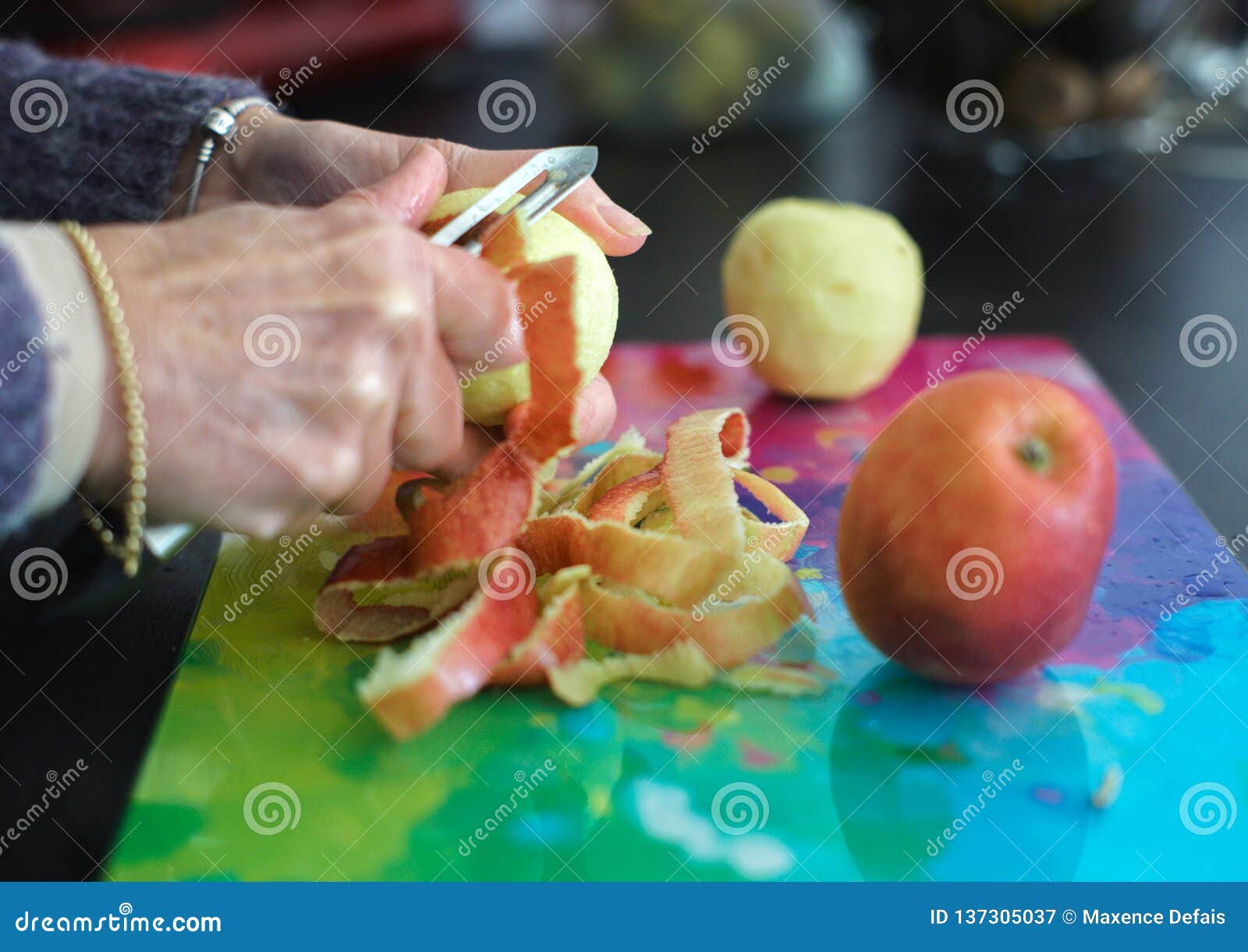 Peeling apples stock image. Image of food, wellbeing - 137305037