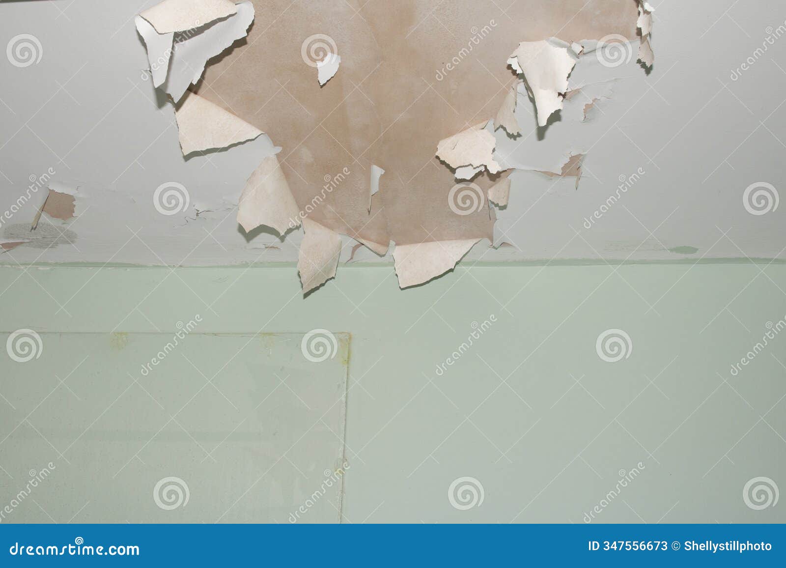 Peeling Damaged Flaking and Falling Down Paint on a Ceiling in a Damp ...