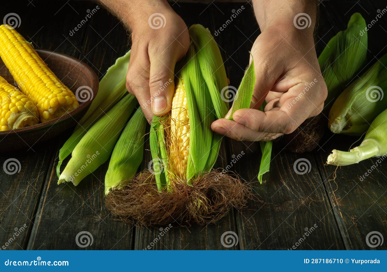 Peeling Heads of Corn from the Shell by the Hands of the Cook before ...