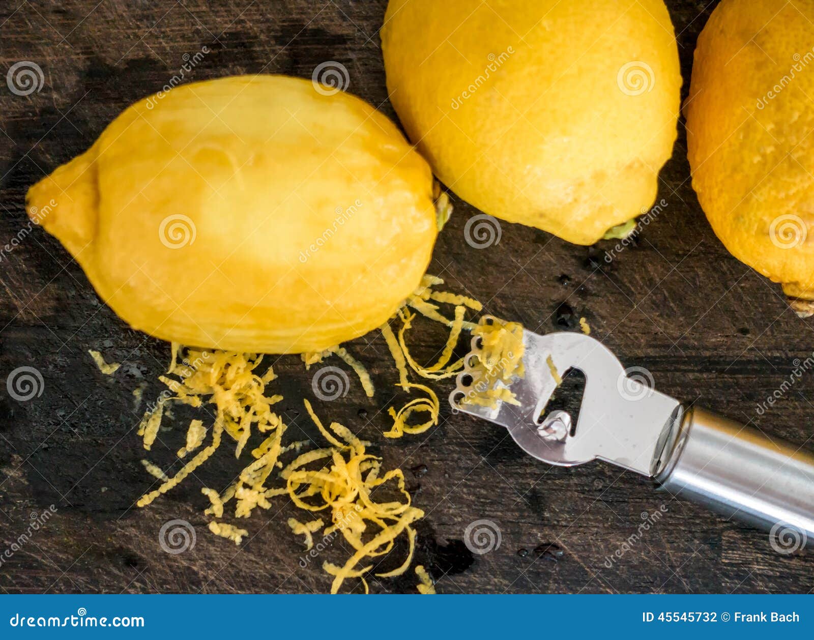 Peeling Lemon Rind To Add Zest Stock Photo - Image of yellow, utensil ...