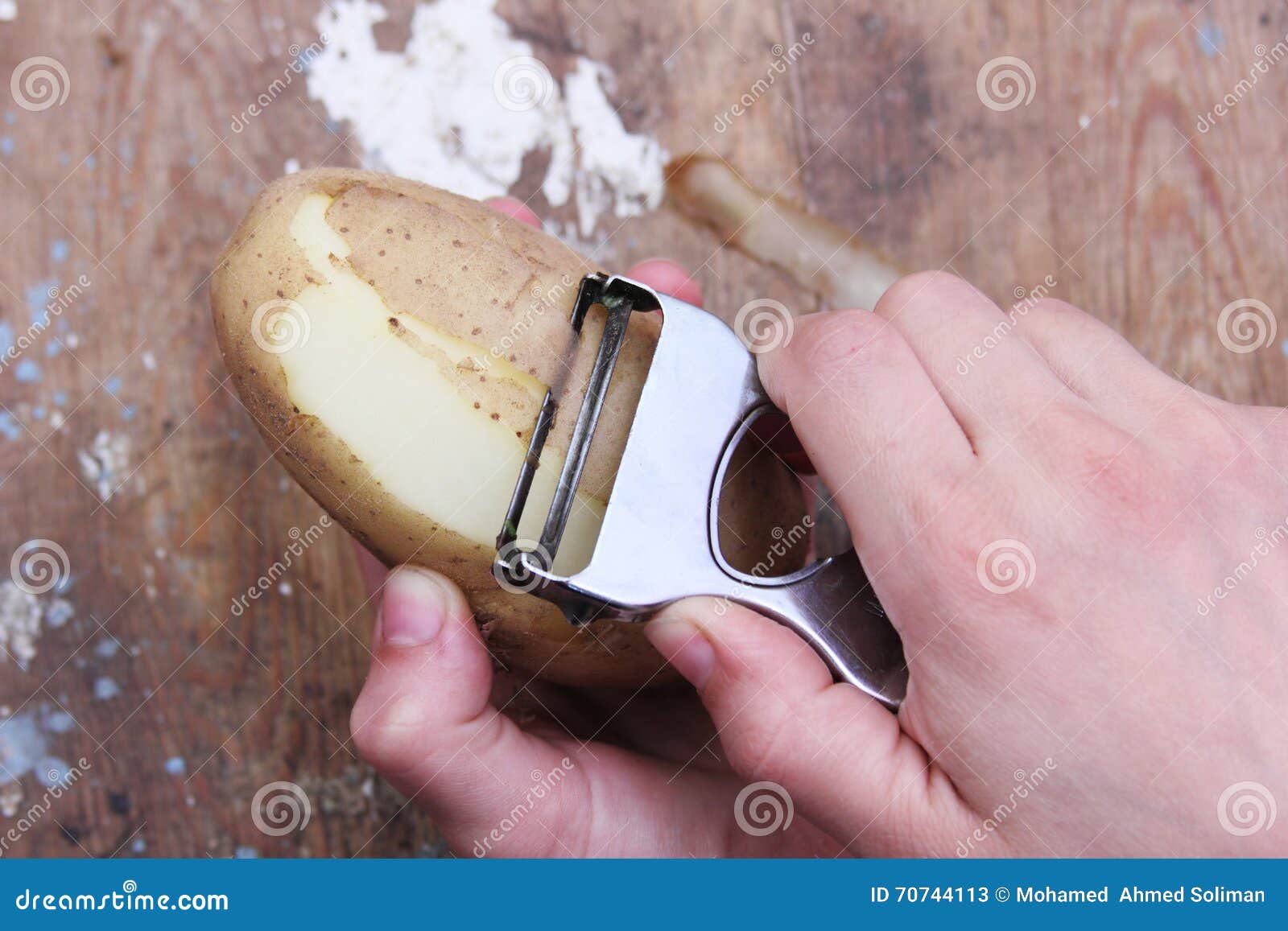 Peeling A Potato With Potato Peeler Royalty-Free Stock Image ...