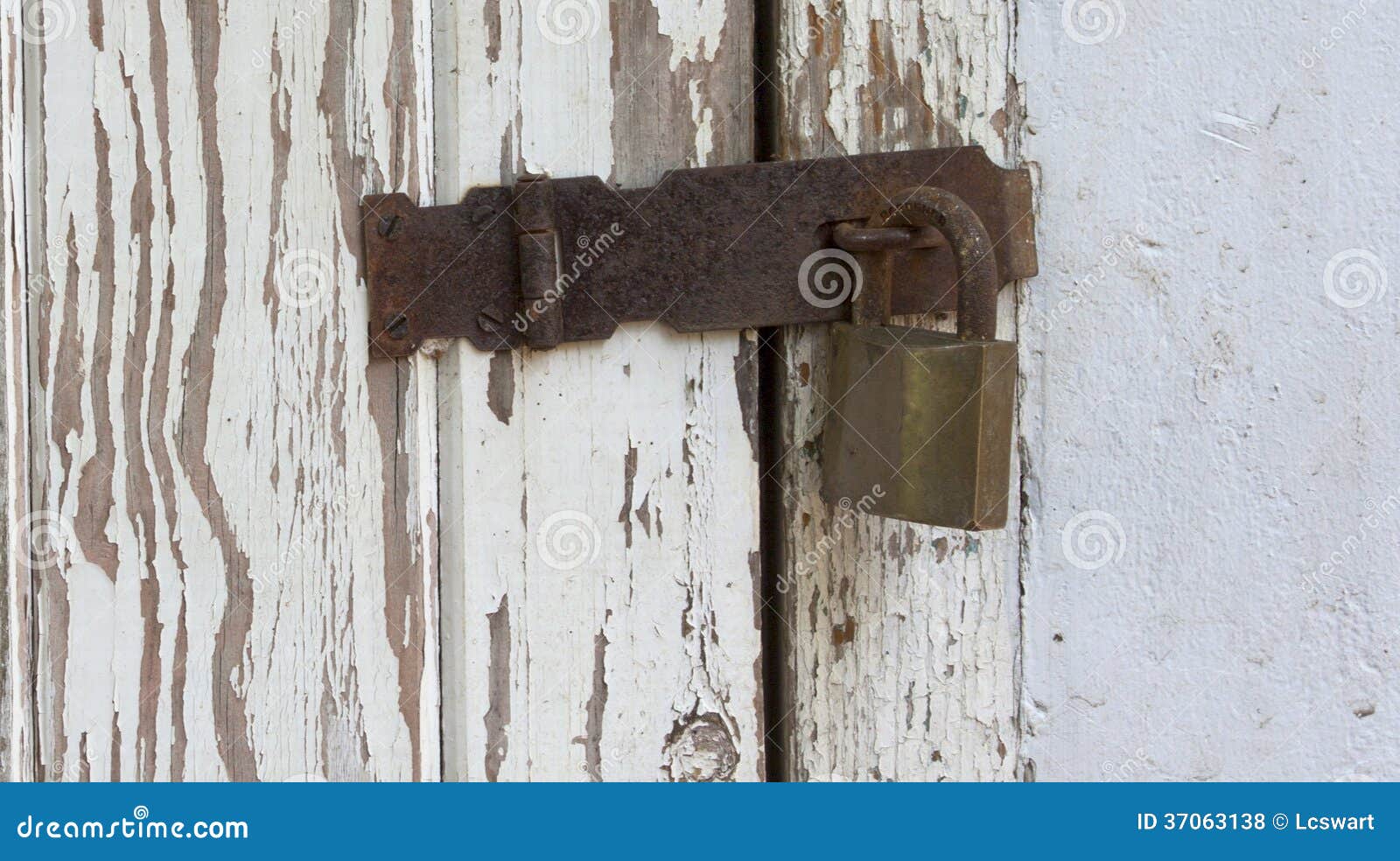 Peeling Wooden Door Secured by Padlock Hasp and Staple Stock Photo ...