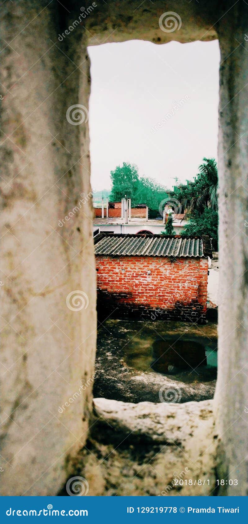 Peeping through a Rectangular Hole . Stock Photo - Image of wall ...