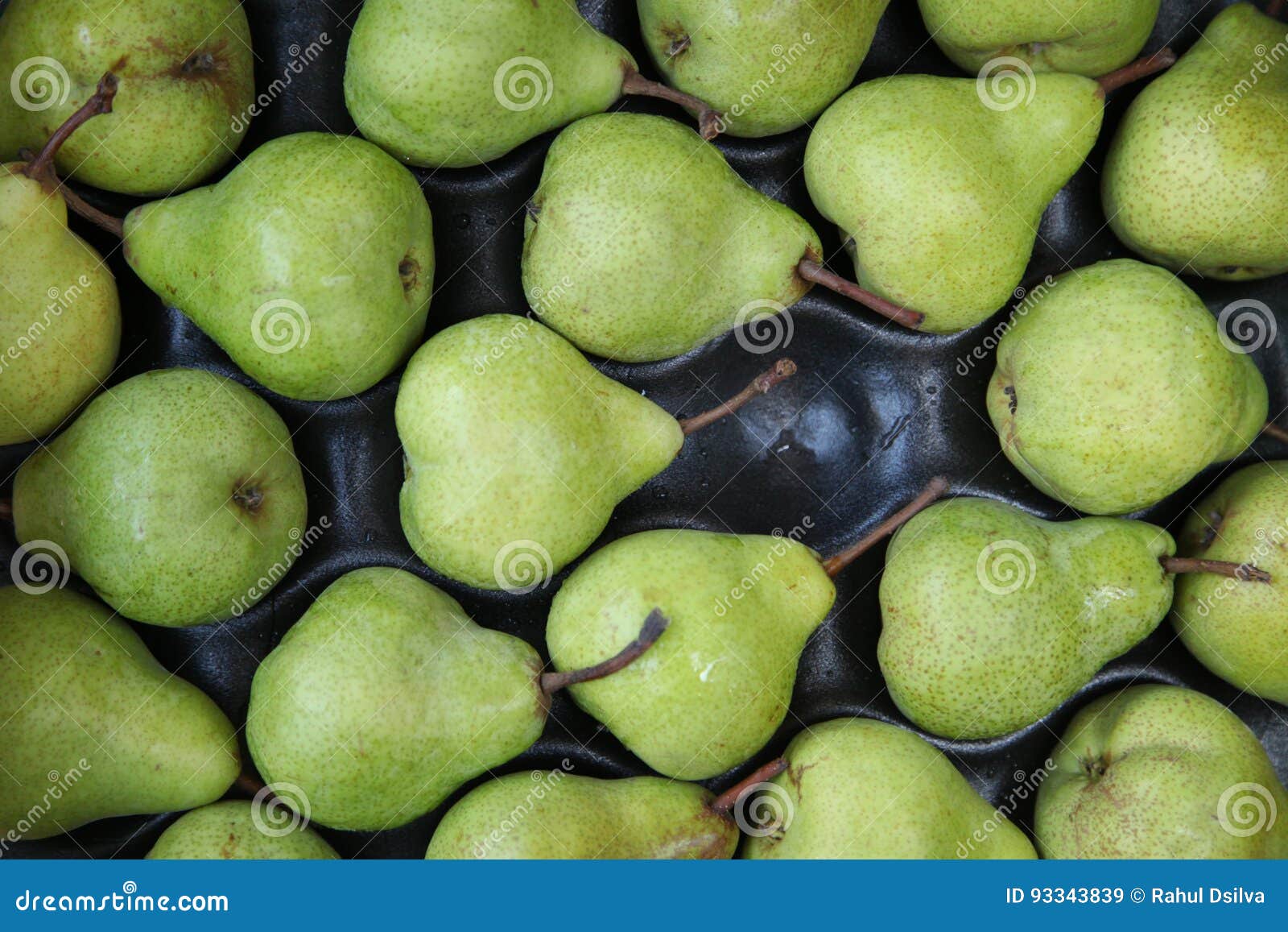 Peer fruit in market stall stock image. Image of organic - 93343839