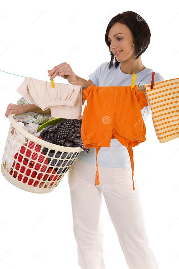 Pegging clothes on line stock image. Image of housework - 4494993