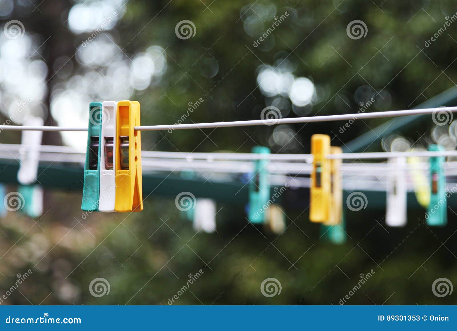 Pegs on a laundry line stock image. Image of daytime - 89301353