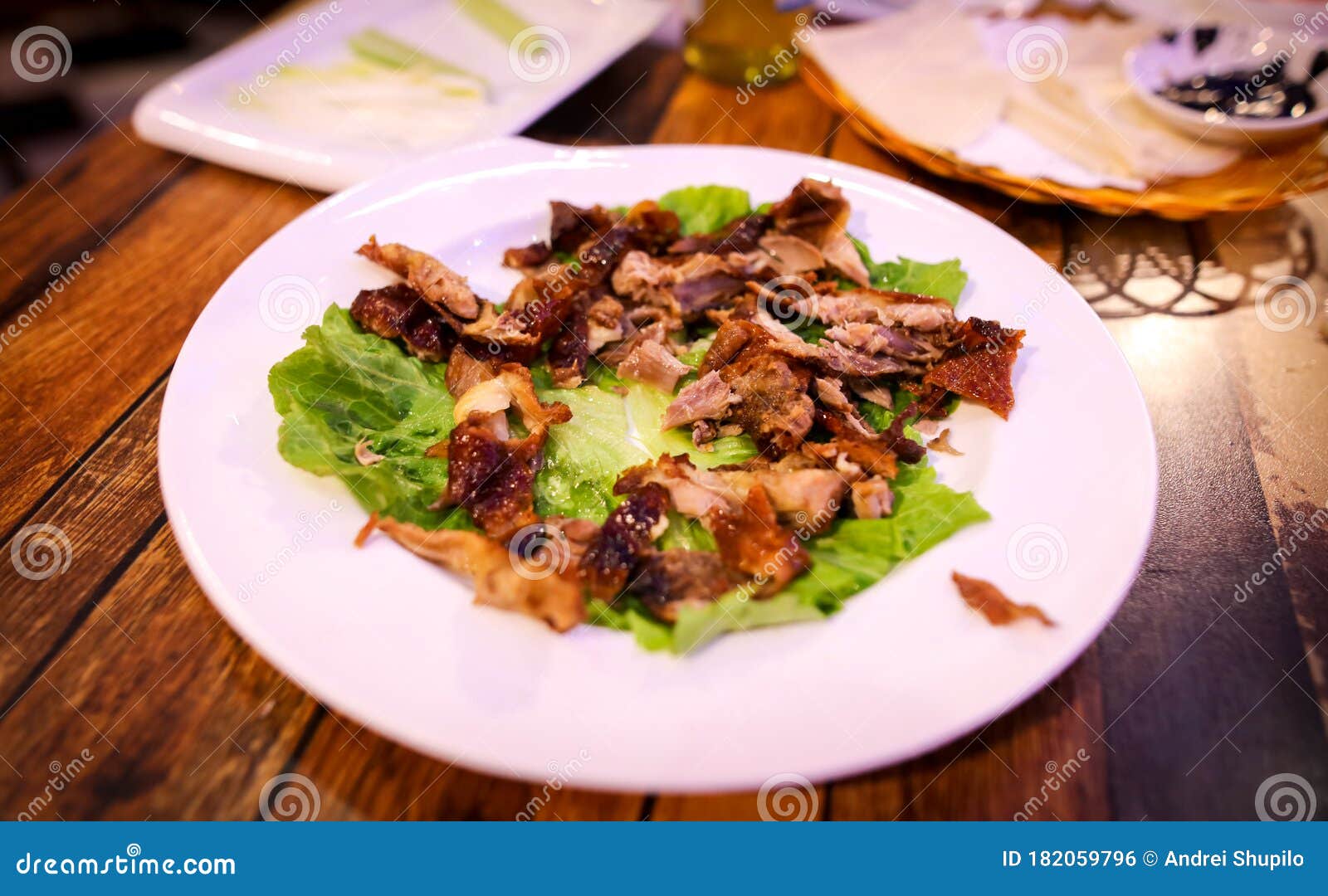 Peking Duck in a Plate on the Table Stock Photo - Image of skin ...