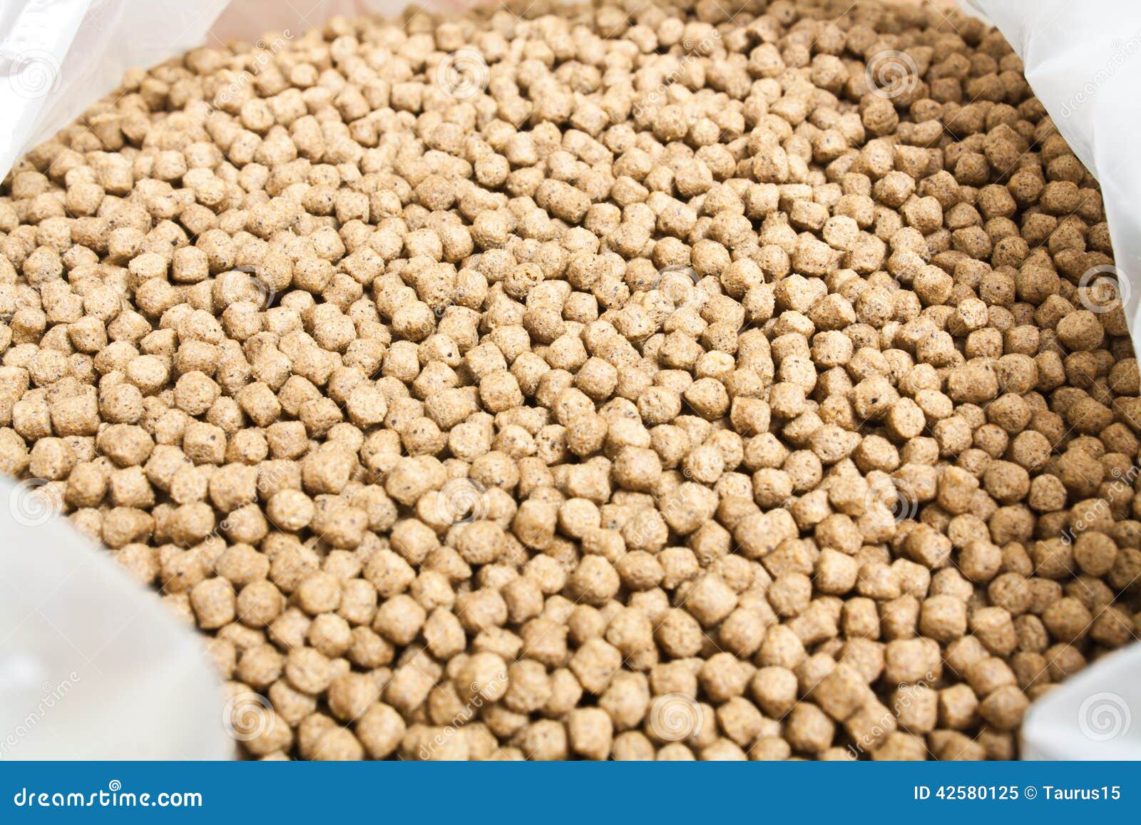 Fish Feed Food. Small Fish Feed In The Plastic Bags.Fish Feed Food For ...