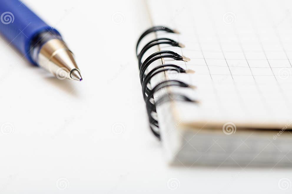 Pen is on Blank Page of the Notebook. Selective Focus on the Tip of a ...