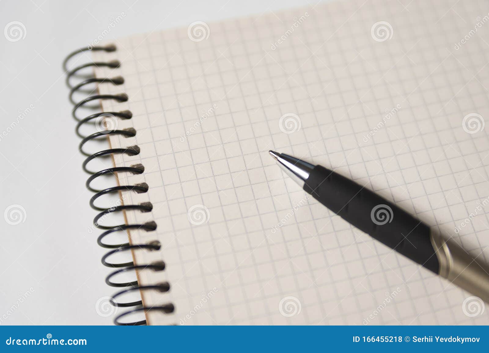Pen on a Blank Page of an Open Notebook. White Background Stock Photo ...