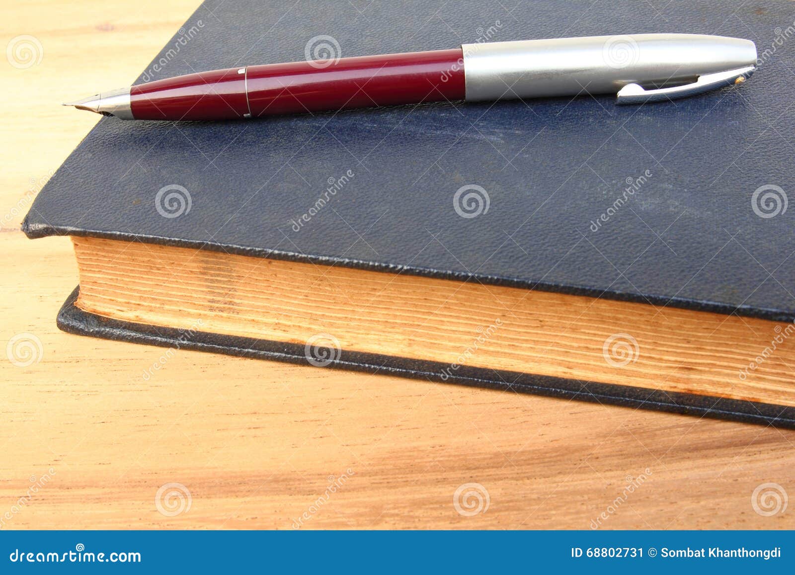 Pen on the book stock image. Image of studioshot, close - 68802731