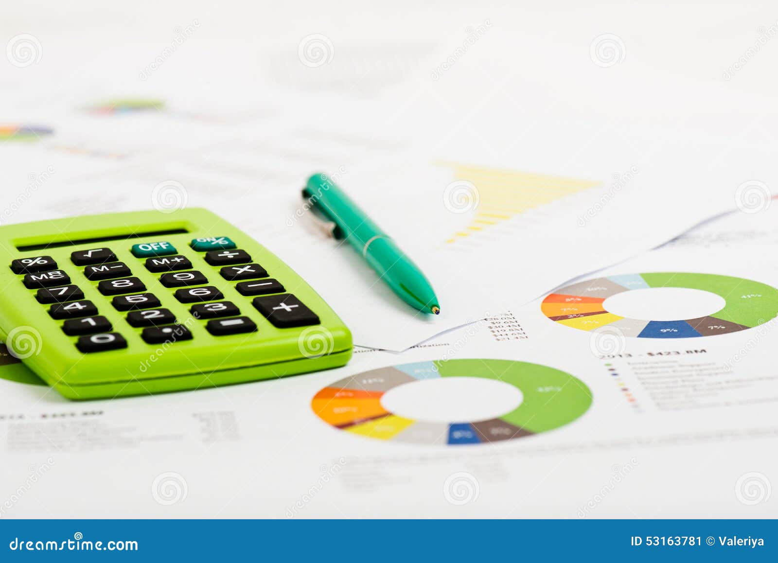 Pen and Calculator on a Paper with Graph and Charts. Stock Image ...