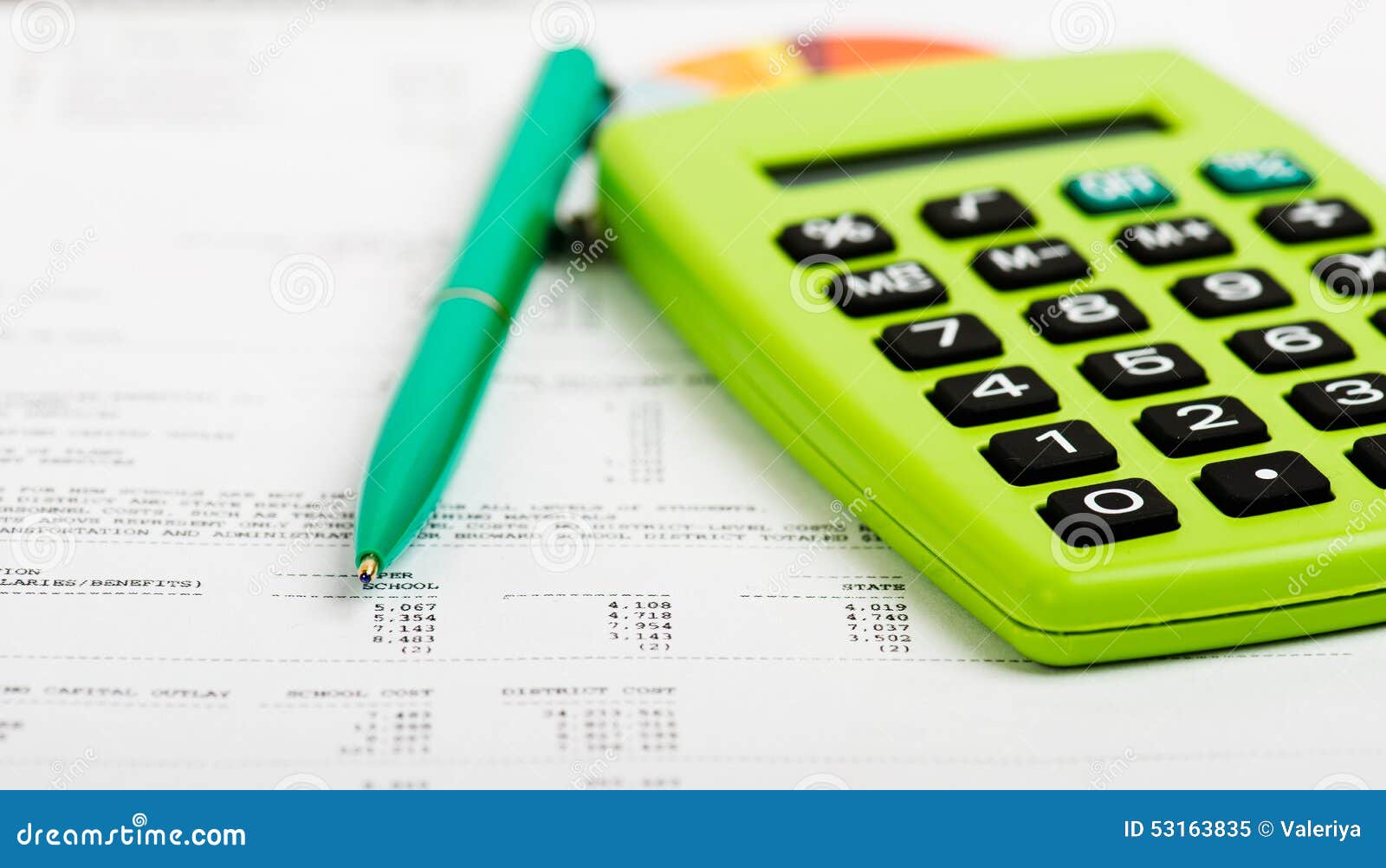 Pen and Calculator on a Paper with Graph and Charts. Stock Image ...