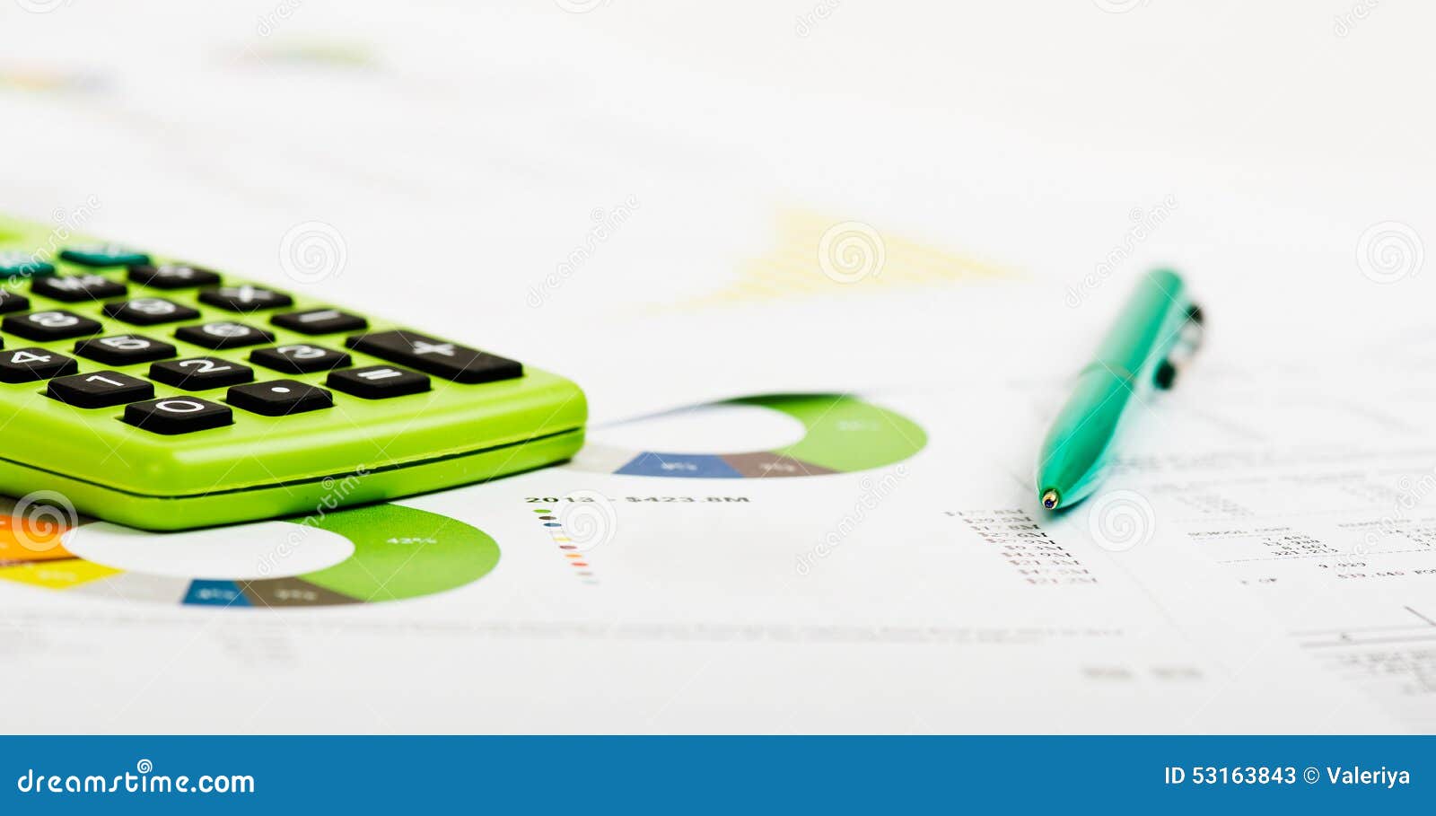 Pen and Calculator on a Paper with Graph and Charts. Stock Image ...