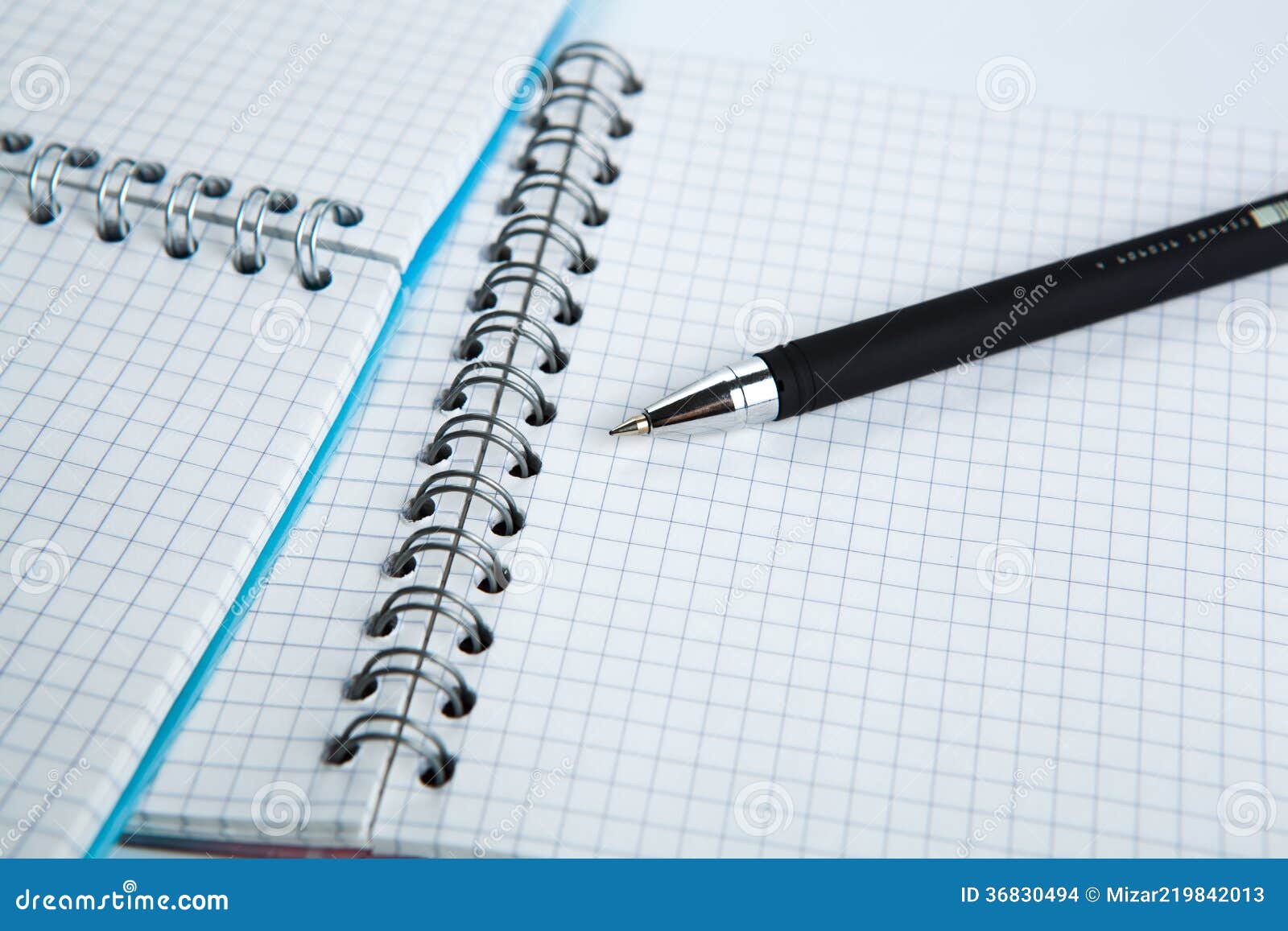 Pen on the Checkered Paper Notebook Stock Photo - Image of plans ...