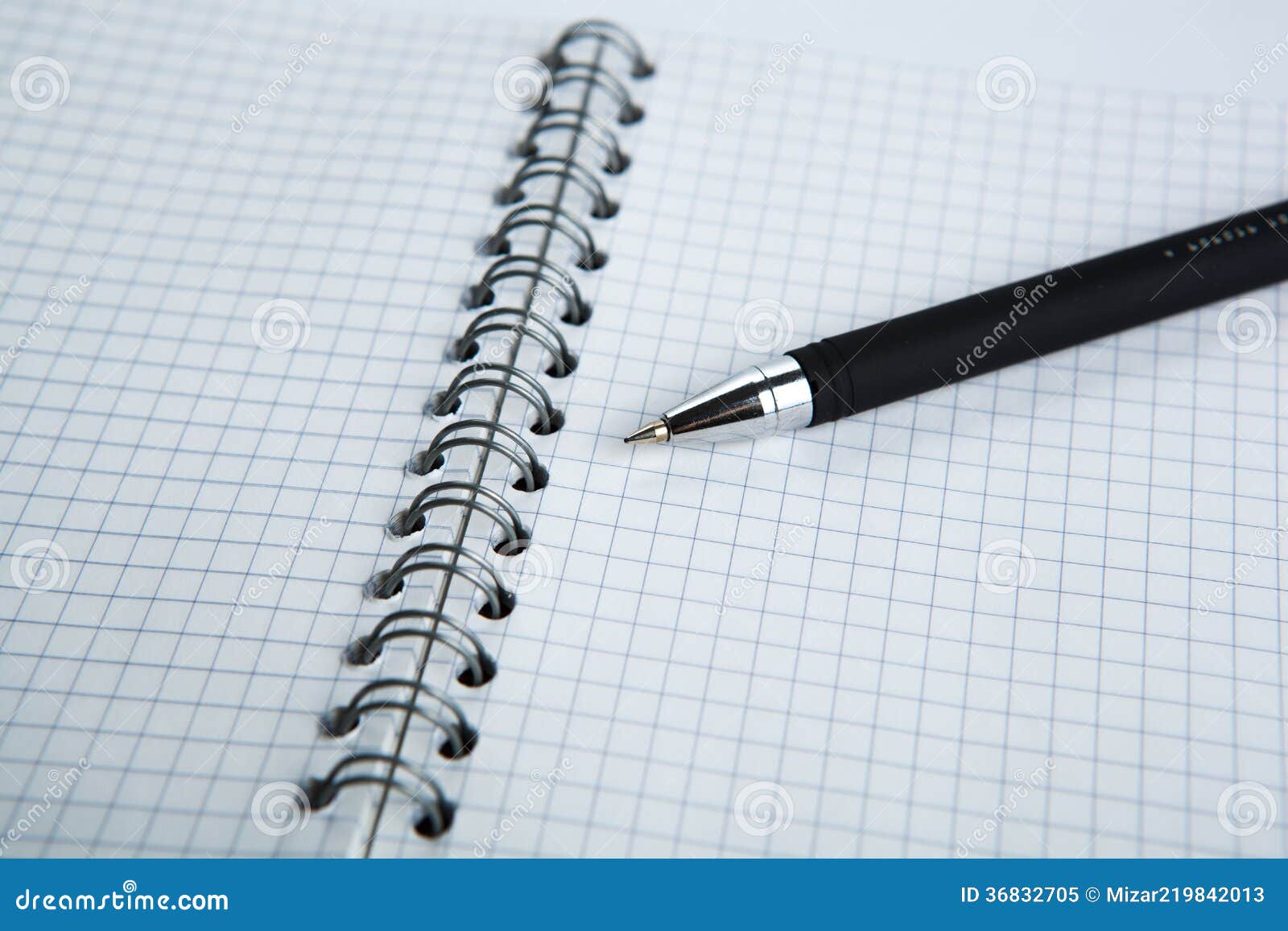 Pen on the Checkered Paper Notebook Stock Image - Image of checkered ...