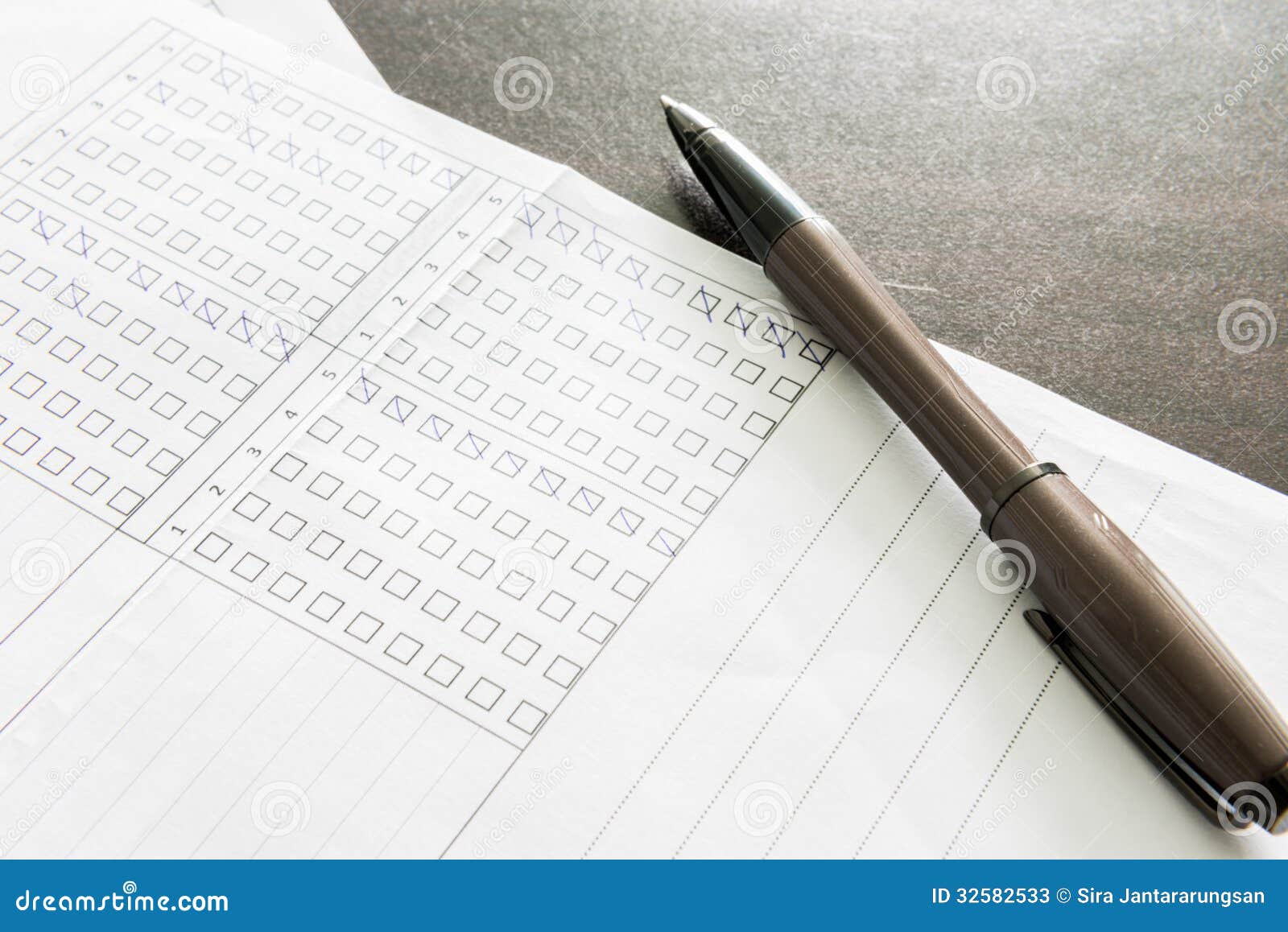 Pen checking a document stock image. Image of business - 32582533