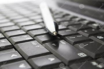Pen on computer keyboard stock image. Image of data, digits - 34792123