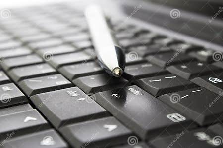 Pen on computer keyboard stock image. Image of data, digits - 34792123