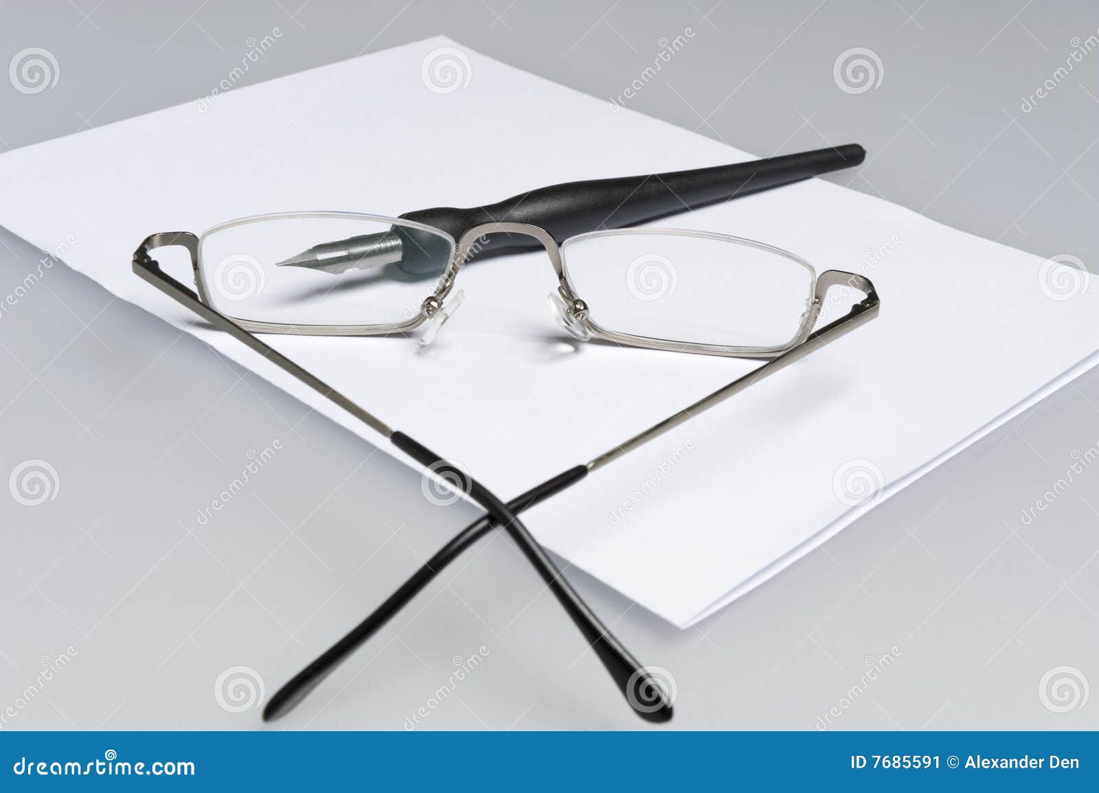 Pen through glasses stock image. Image of hand, white - 7685591