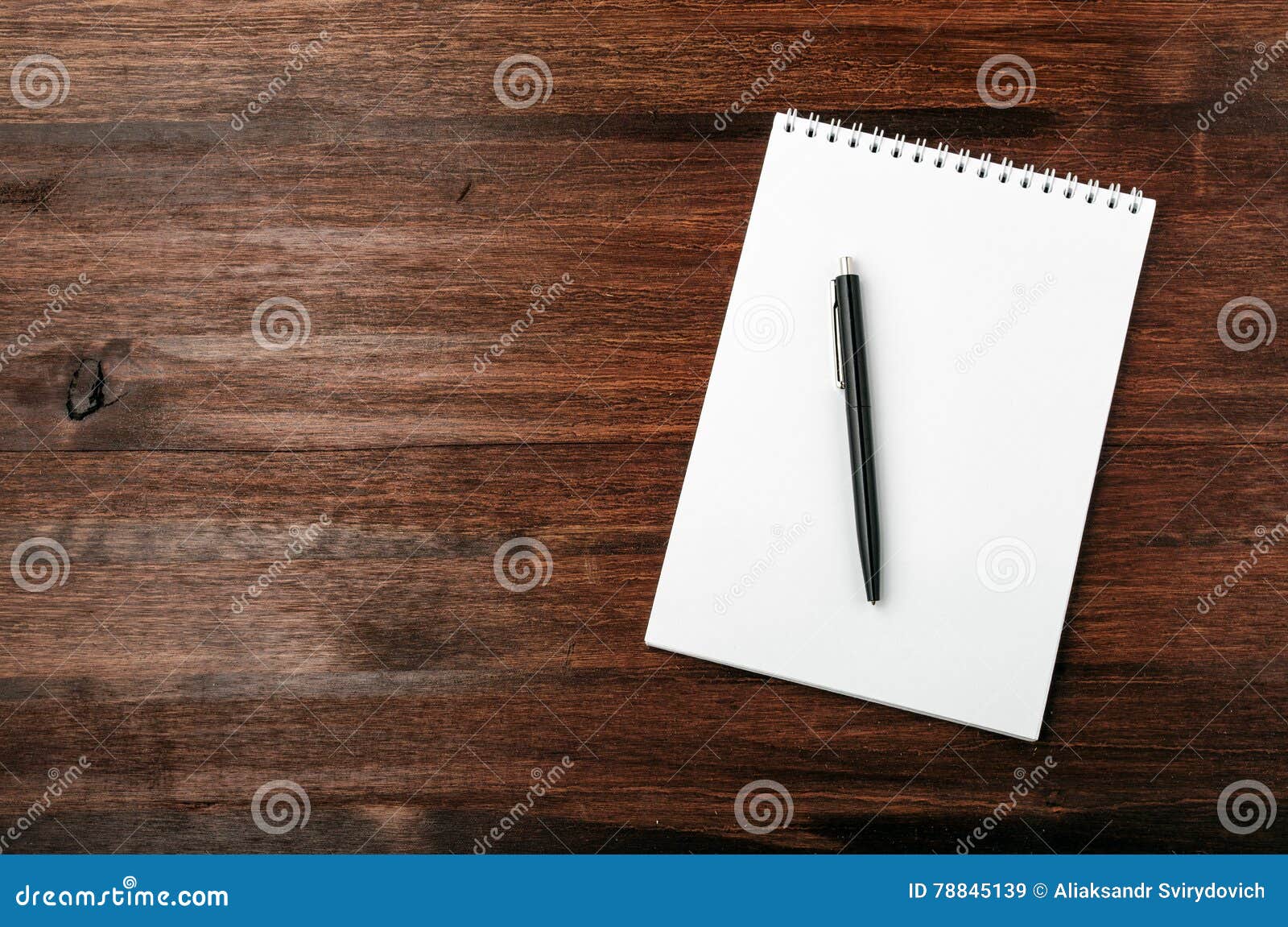 Pen and Notebook on Red Wood Table. Top View Stock Image - Image of ...