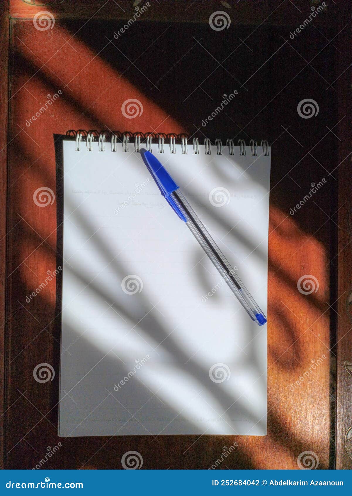 A Pen and Notebook on a Table Stock Photo - Image of drawing, pattern ...