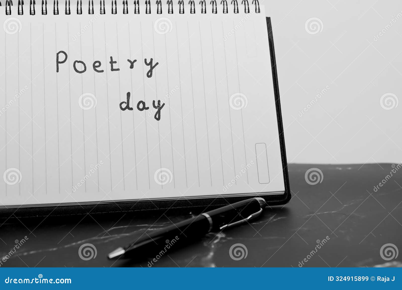 A Pen and a Notebook with the Word Poetry Written on it Stock Image ...