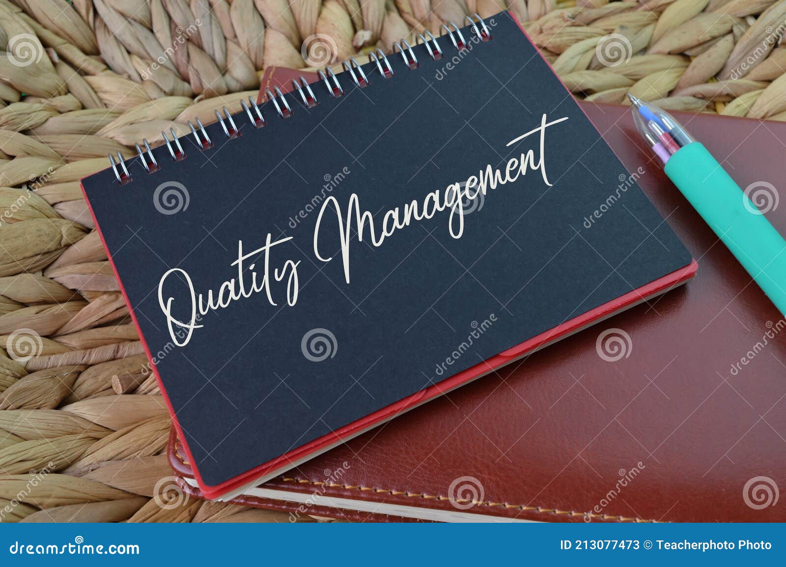 Pen and Notebooks Written with QUALITY MANAGEMENT Stock Image - Image ...