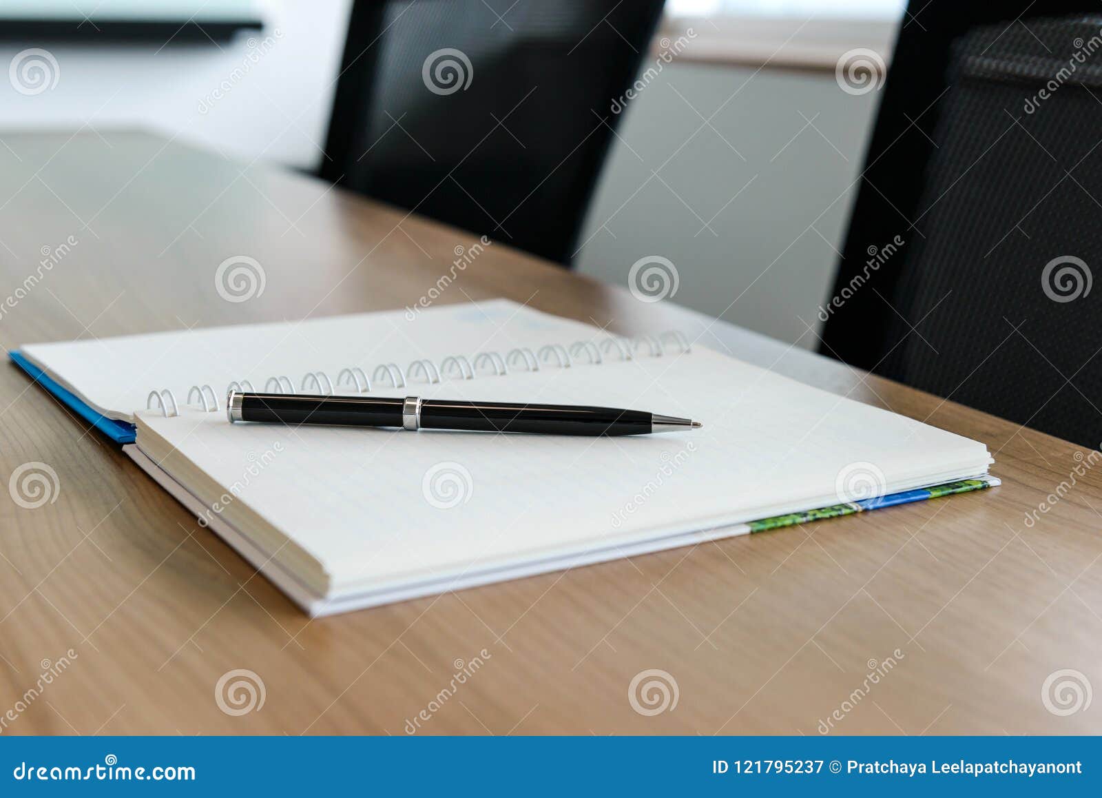 Pen on Notepad for Agenda Kept on Table in Corporate Conference Room ...