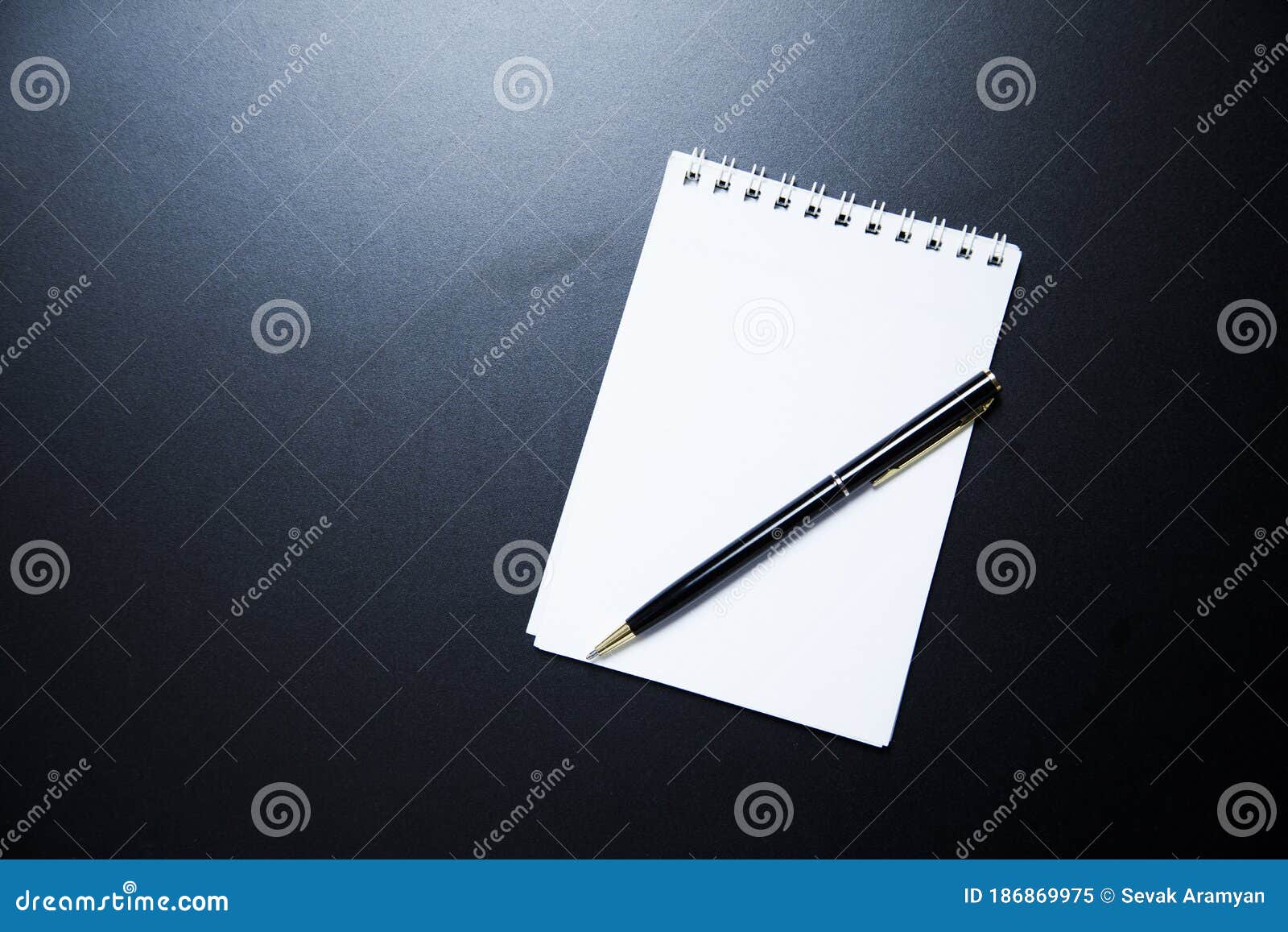 Pen on notepad stock image. Image of blank, dark, notepad - 186869975
