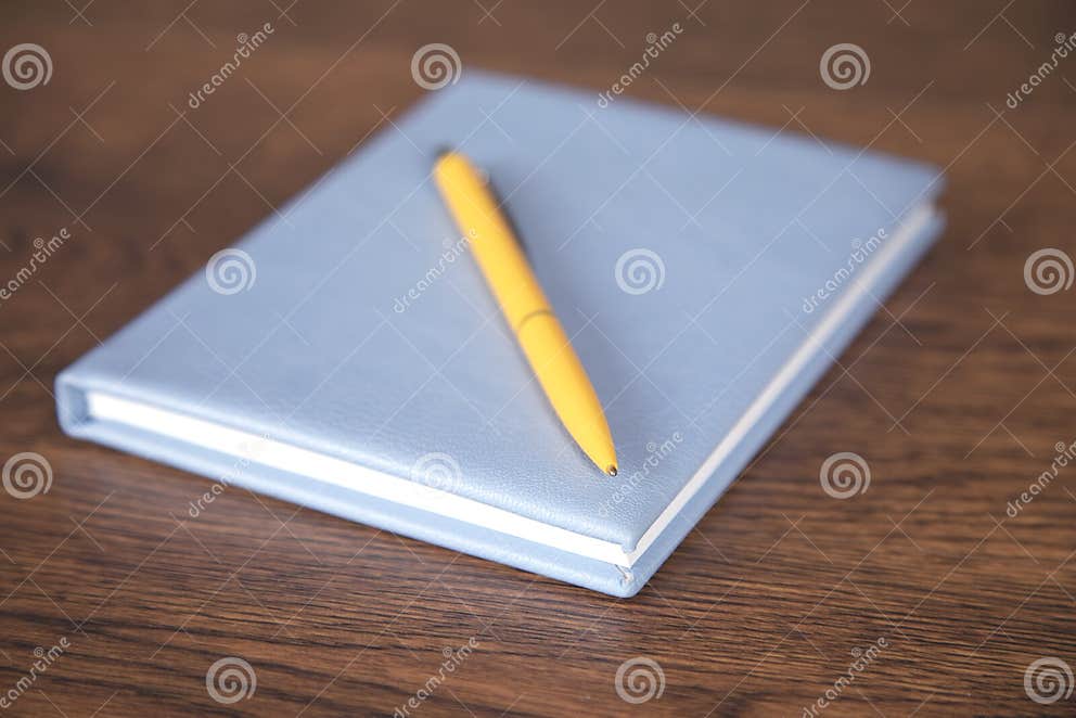 Pen on notepad on table stock photo. Image of write - 179634106