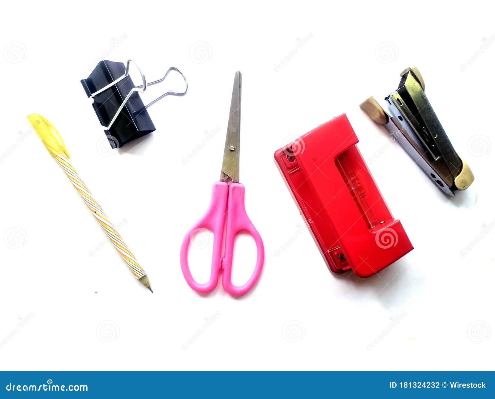 Pen, a Paper Clip, a Stapler and Scissors Isolated on a White Surface ...