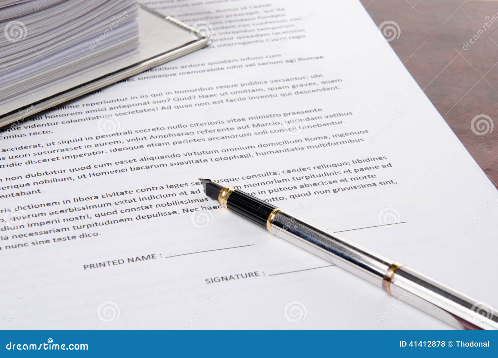 Pen on a paper to sign stock photo. Image of success - 41412878