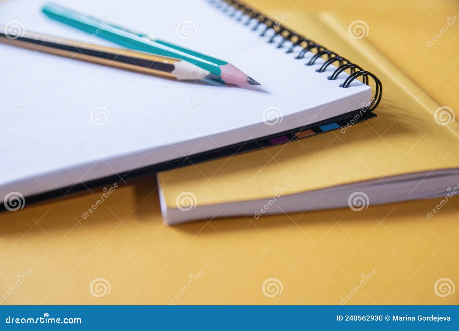 Pen and Pencil in a Diary, a Book on the Desktop at the Workplace Stock ...