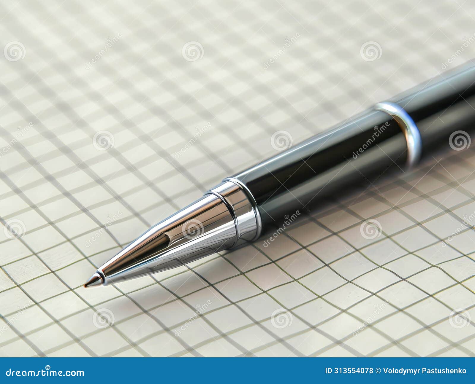 A Pen is Sitting on Top of a Grid Paper Stock Photo - Image of marking ...